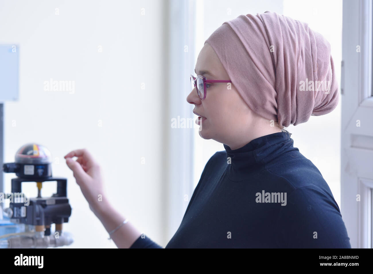 Group of young students in technical vocational training with young ...