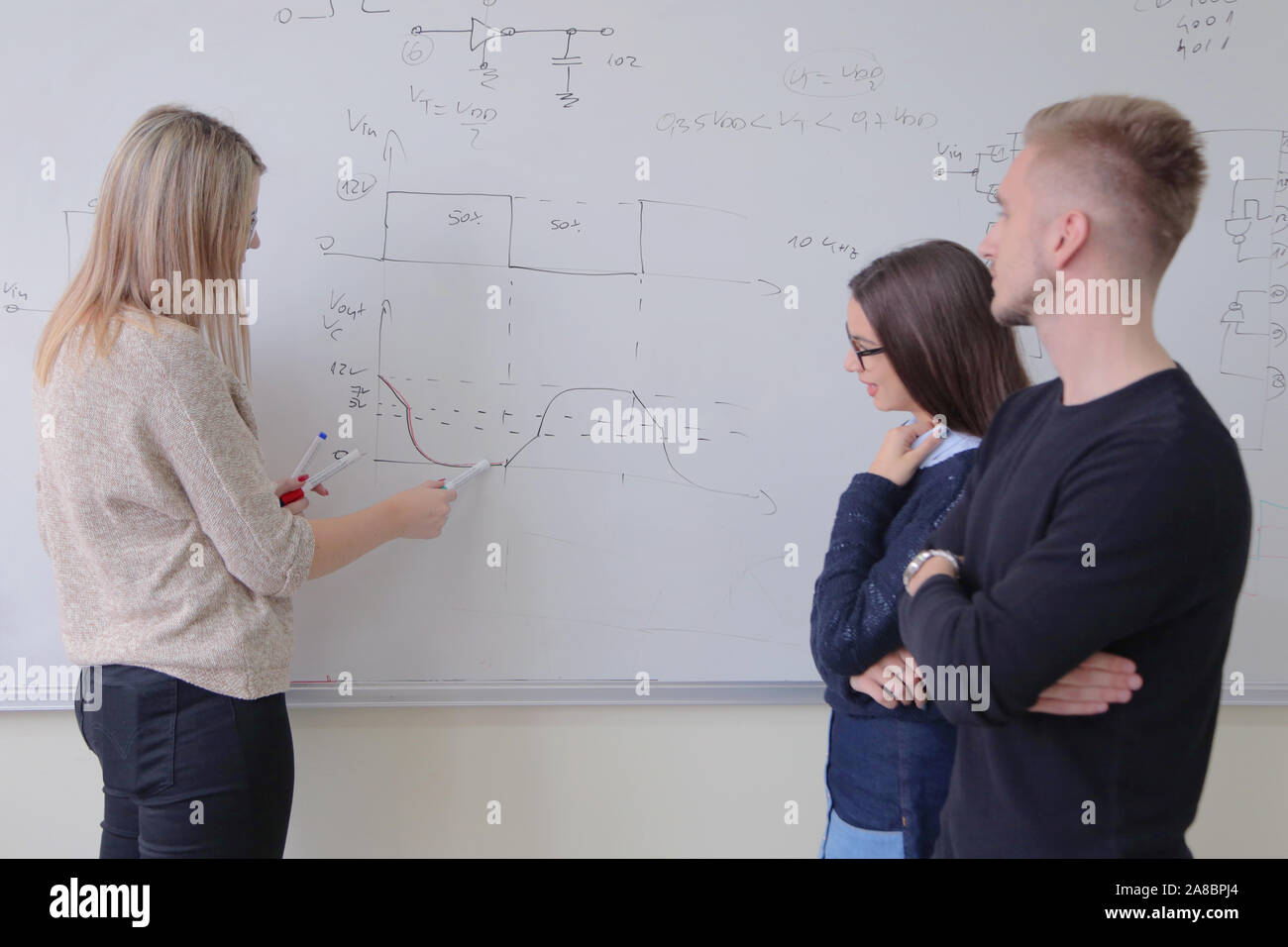 Teacher resolving classroom hi-res stock photography and images - Alamy