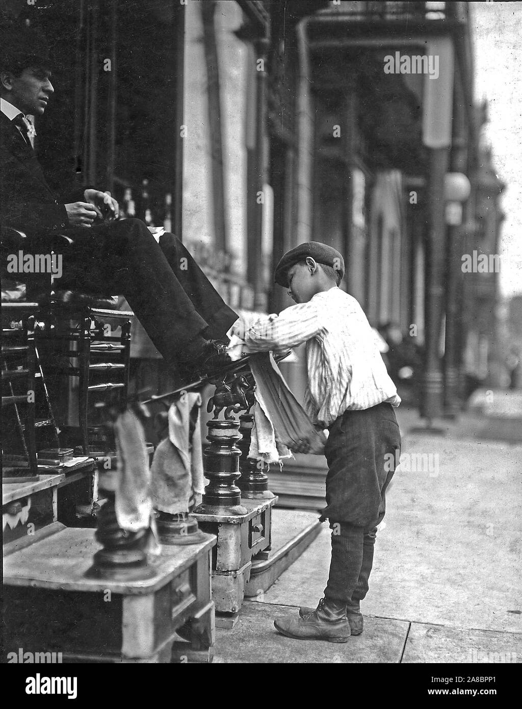 Early 1900s bootblack hi-res stock photography and images - Alamy