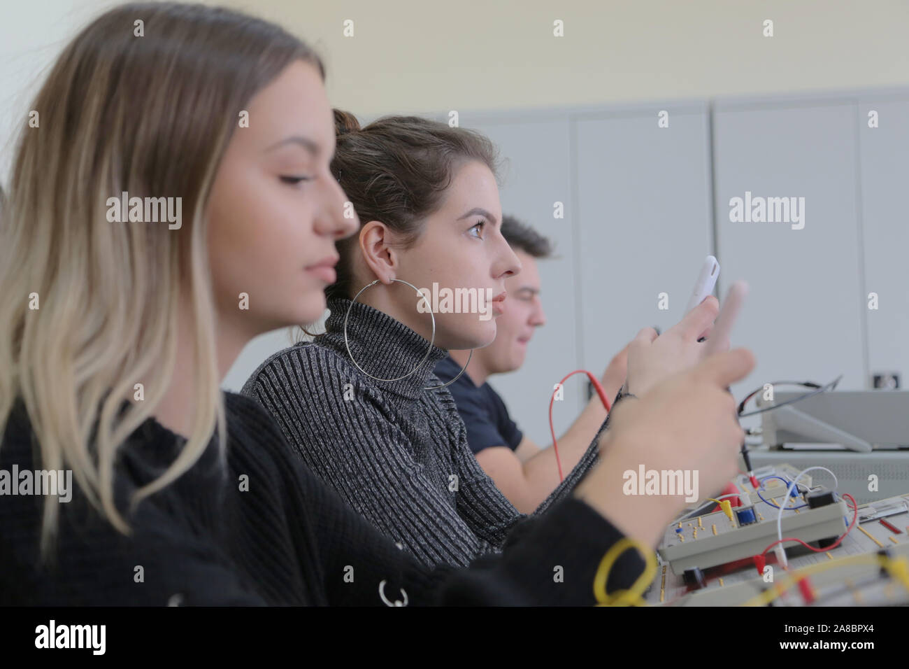 Group of young students in technical vocational training. Education and ...