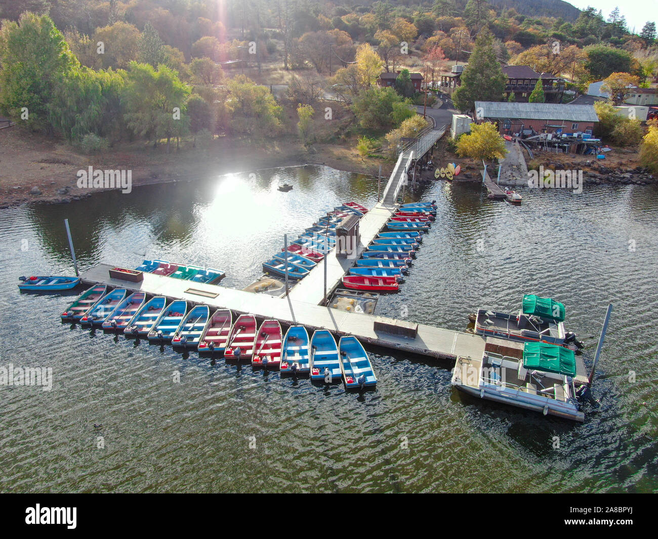 Aerial view of pier with small boat at Lake Cuyamaca, 110 acres ...