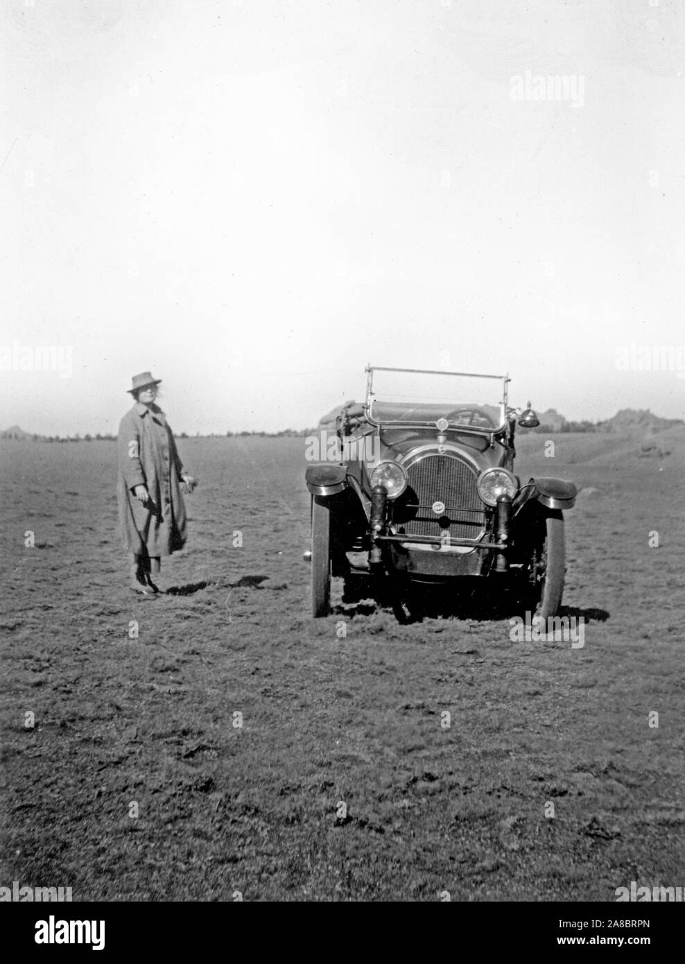 Woman next car in Black and White Stock Photos & Images - Alamy