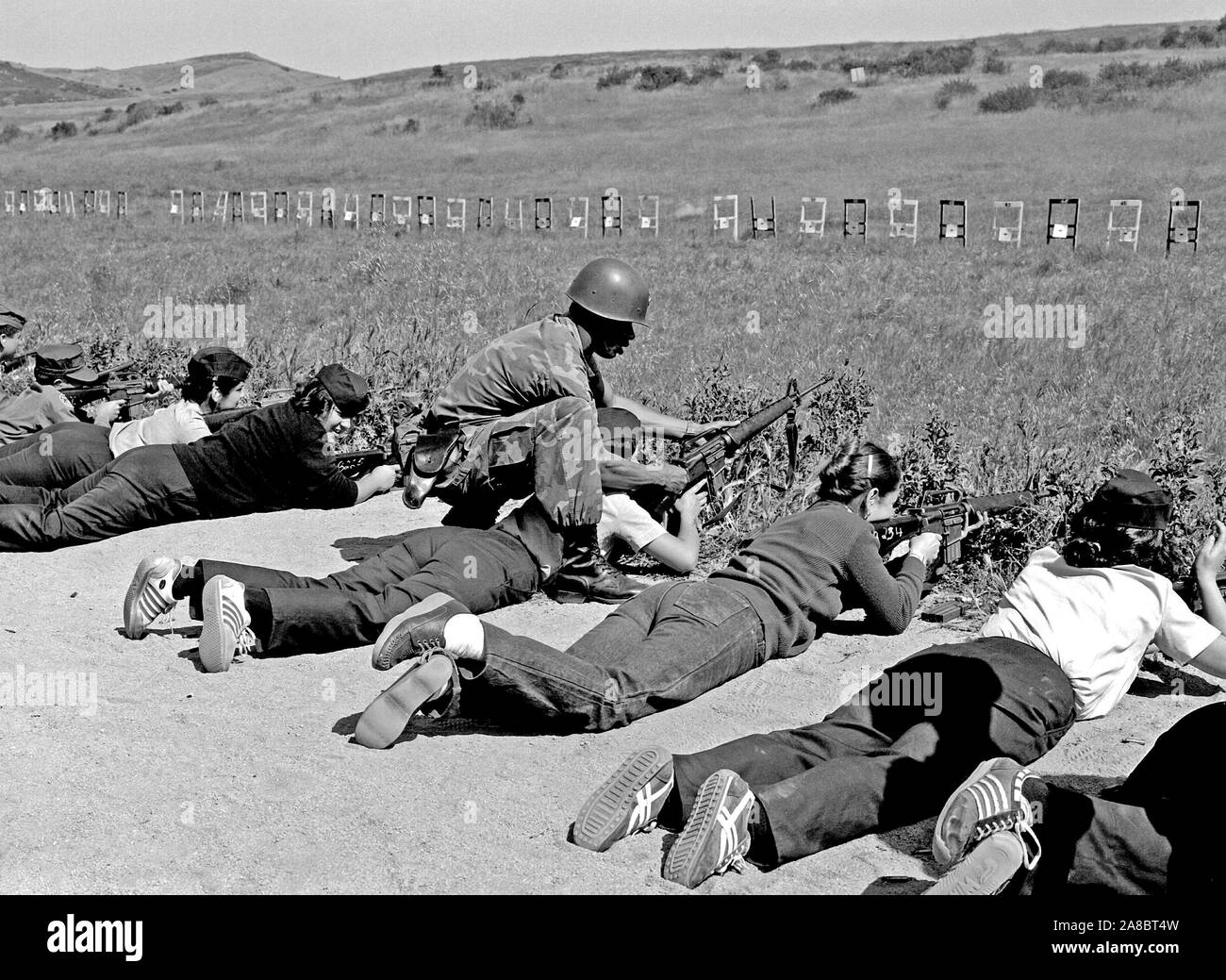 1979 - Female Marine Corps JROTC students practice firing the M-16A1 ...