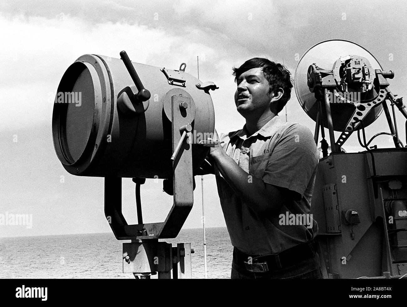 1979 - A signalman aboard the guided missile destroyer USS DEWEY (DDG ...