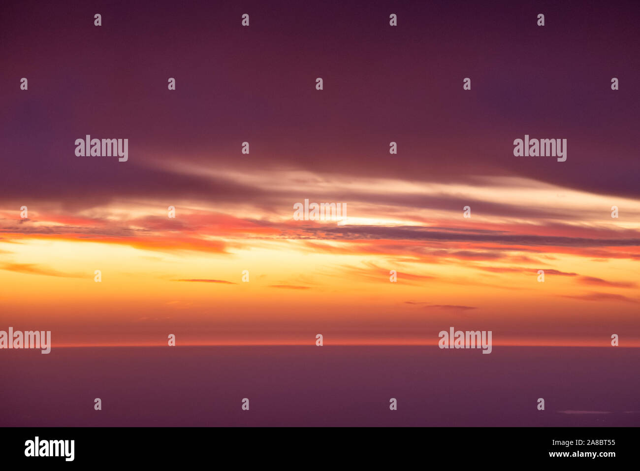 Airplane in sky sunset over ocean hi-res stock photography and images ...