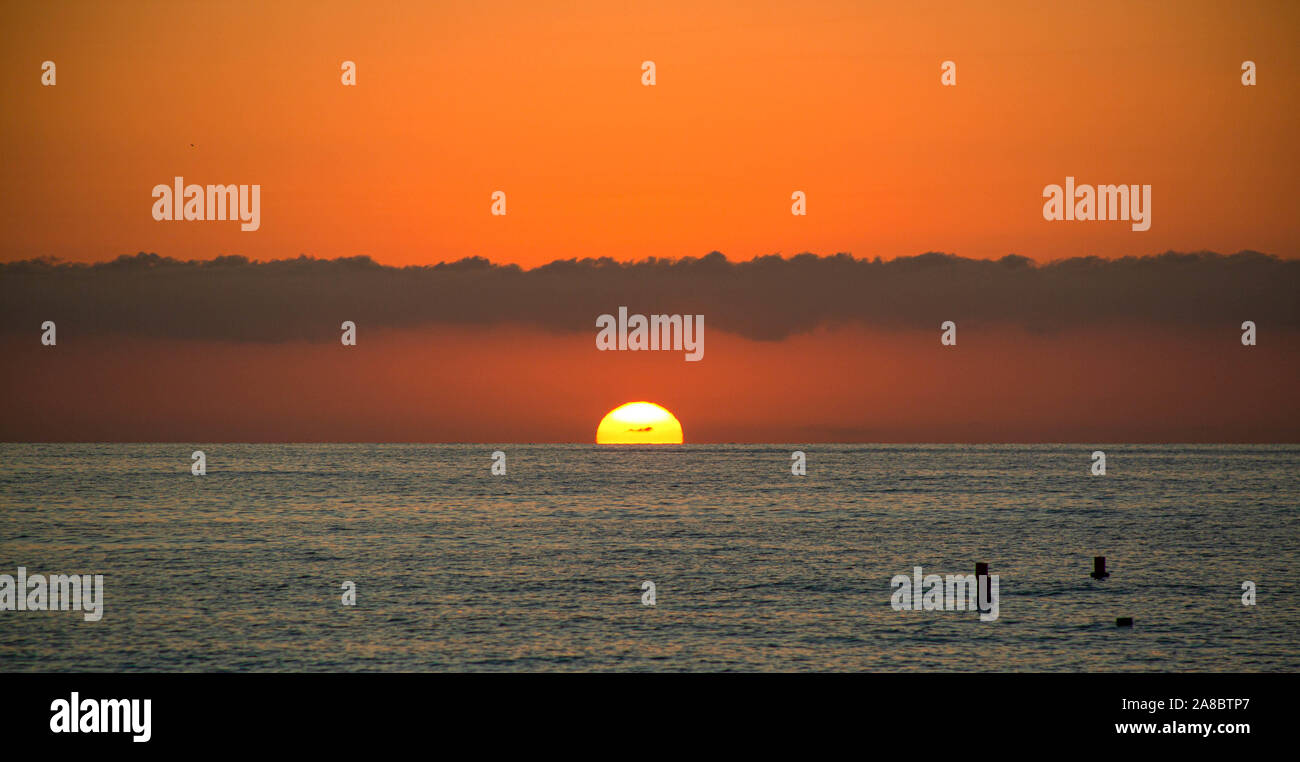Sun Rising from the Sea in Spain Stock Photo - Alamy