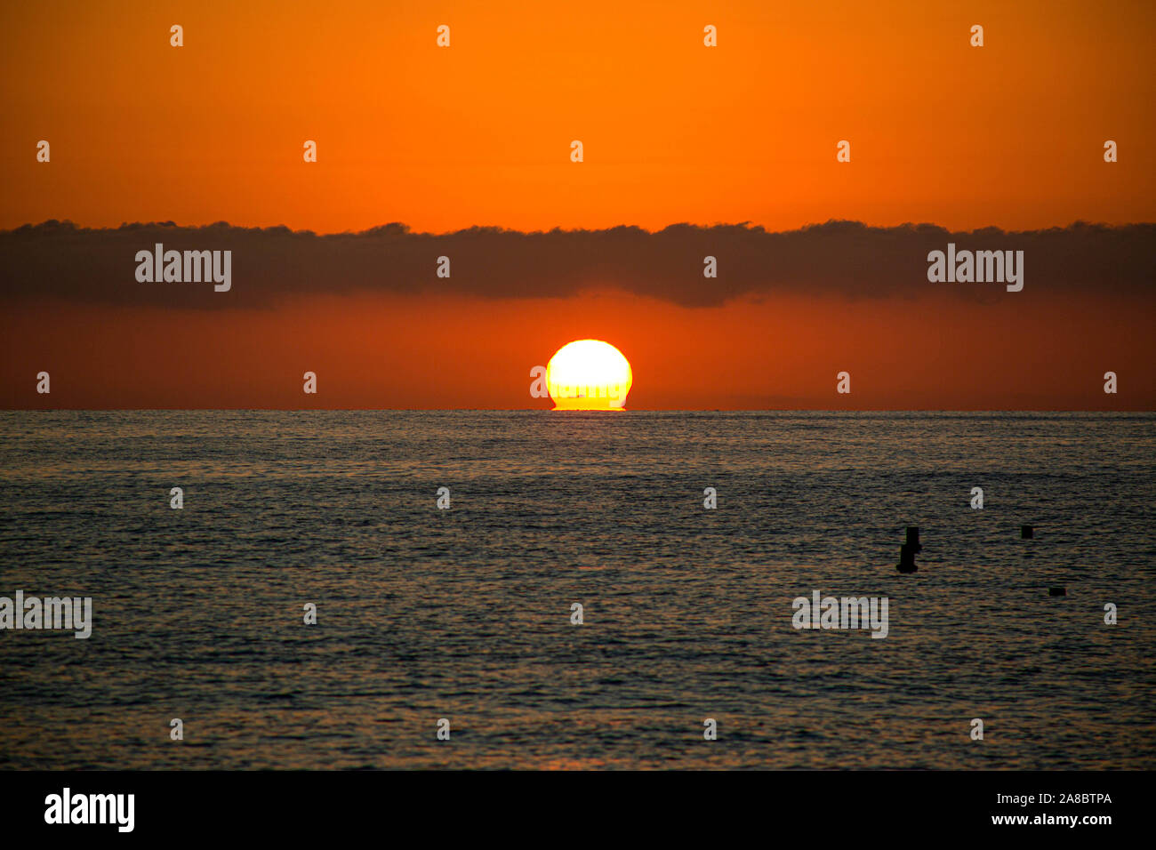 Sun Rising from the Sea in Spain Stock Photo - Alamy