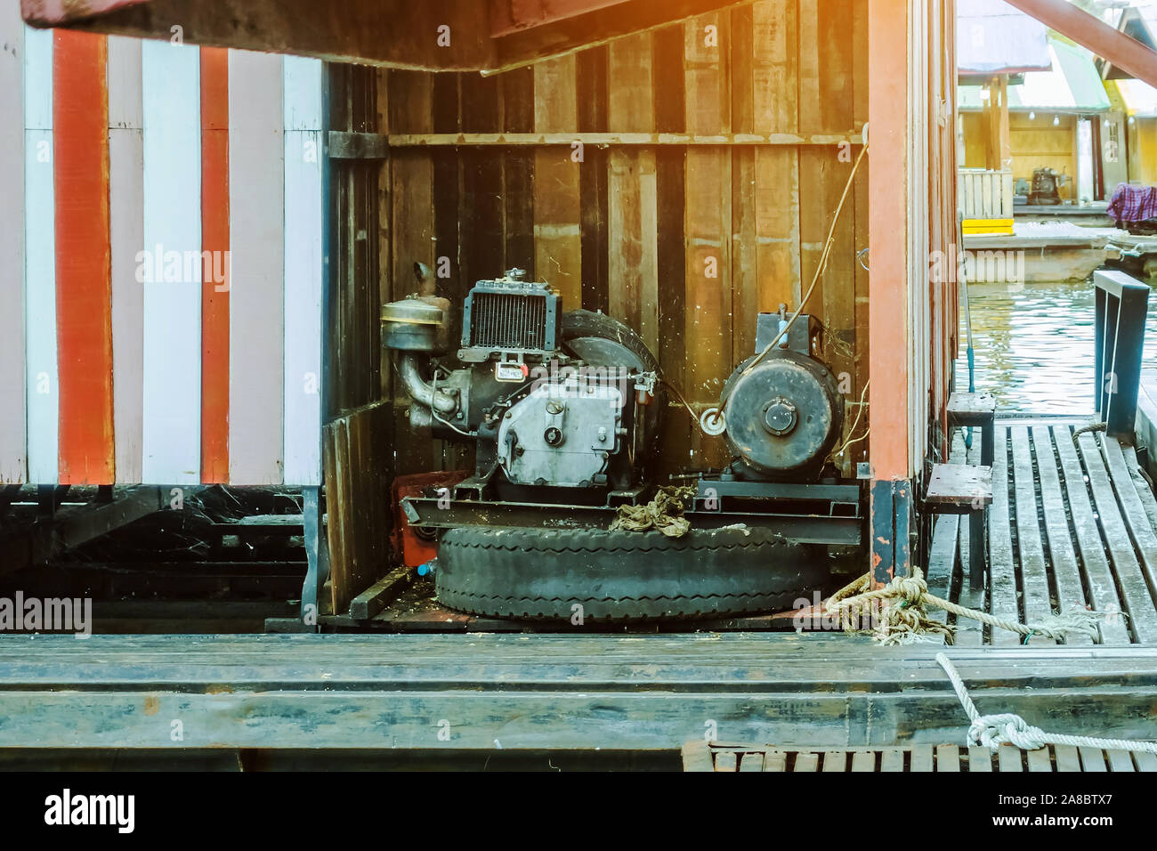 The old electricity generator for floating wooden raft house by using ...