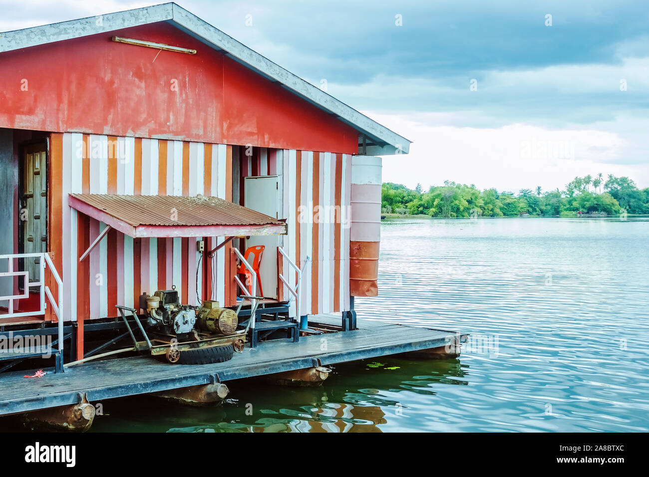 The old electricity generator for floating wooden raft house by using ...