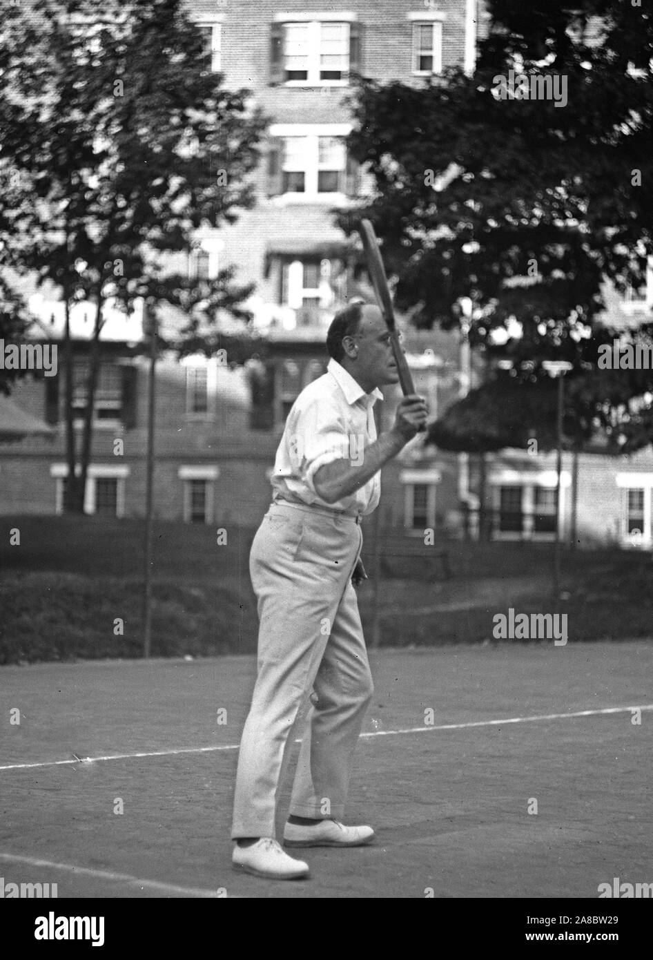 Early 1900s playing tennis hi-res stock photography and images - Alamy
