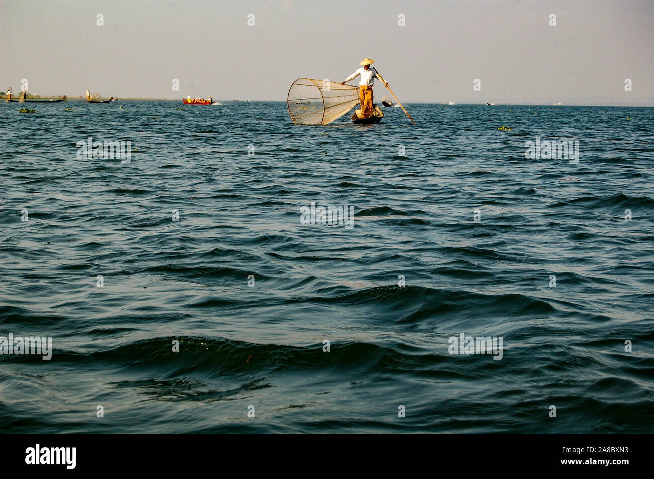 Traditional Myanmar Inle Lake fishing technique Stock Photo - Alamy