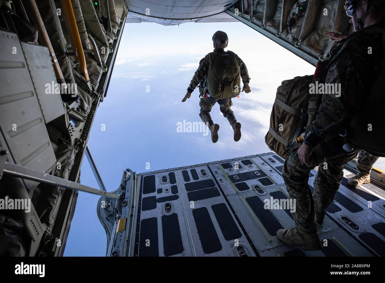 A U.S. Marine with 3rd Reconnaissance Battalion prepares to perform a ...