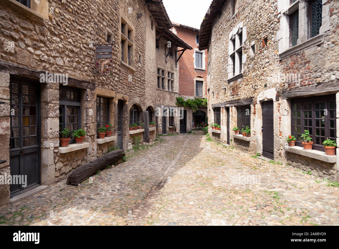 Beautiful view of scenic narrow alley with historic traditional houses ...