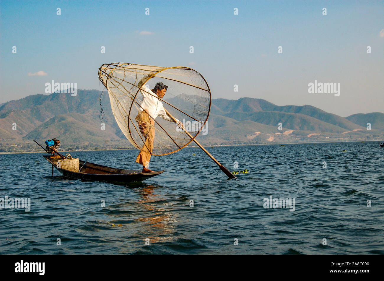 Traditional Myanmar Inle Lake fishing technique Stock Photo - Alamy