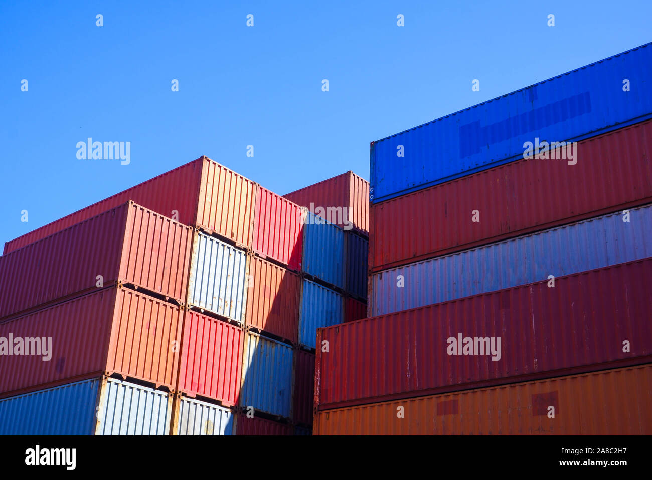 Container stack For importing and exporting goods Stock Photo - Alamy