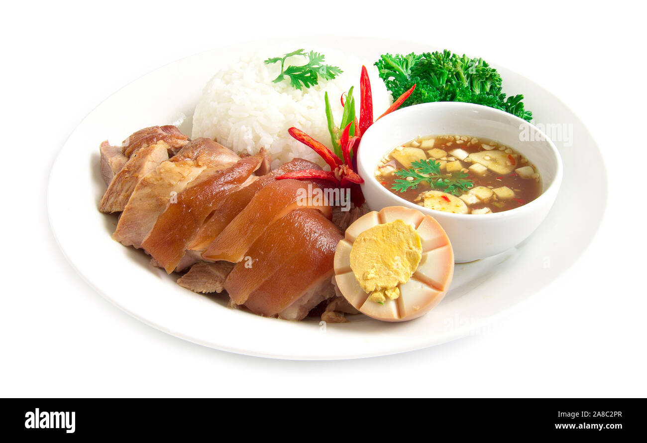 Stewed pork leg rice with egg in Brown sweet sauce and spicy sauce ...