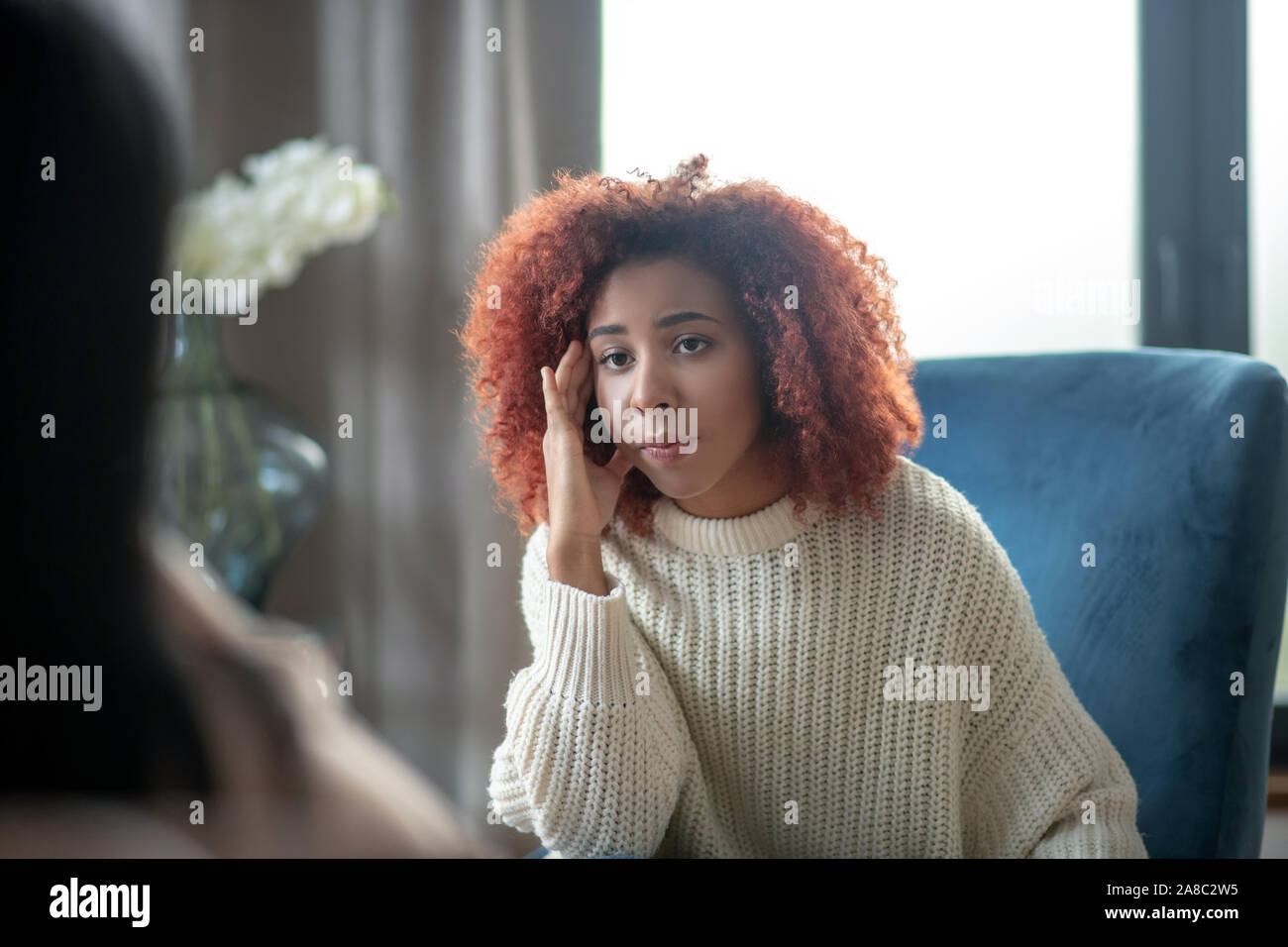 Confused woman speaking hi-res stock photography and images - Alamy