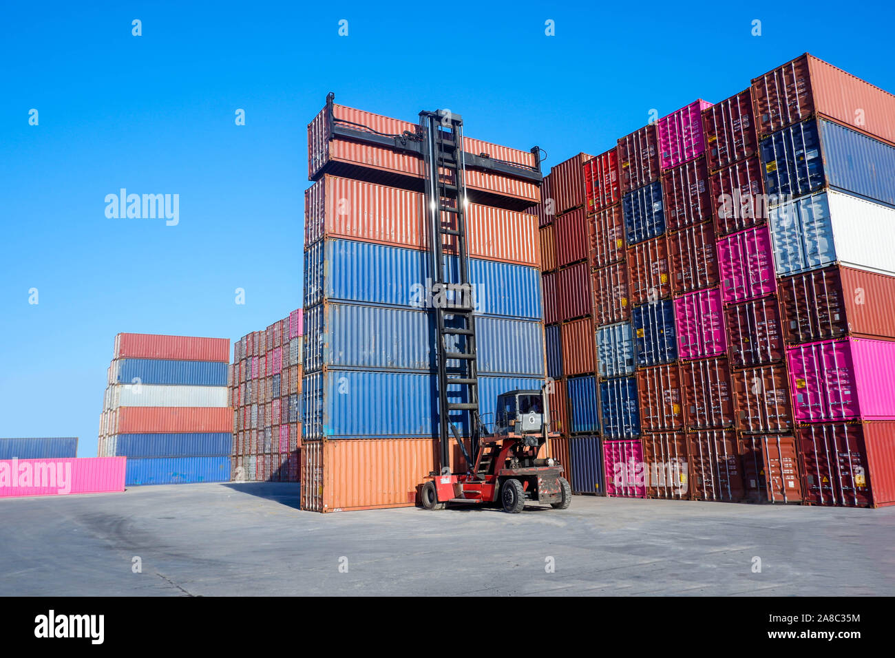 Toplifter handles cargo containers. In the import and export zone Stock ...