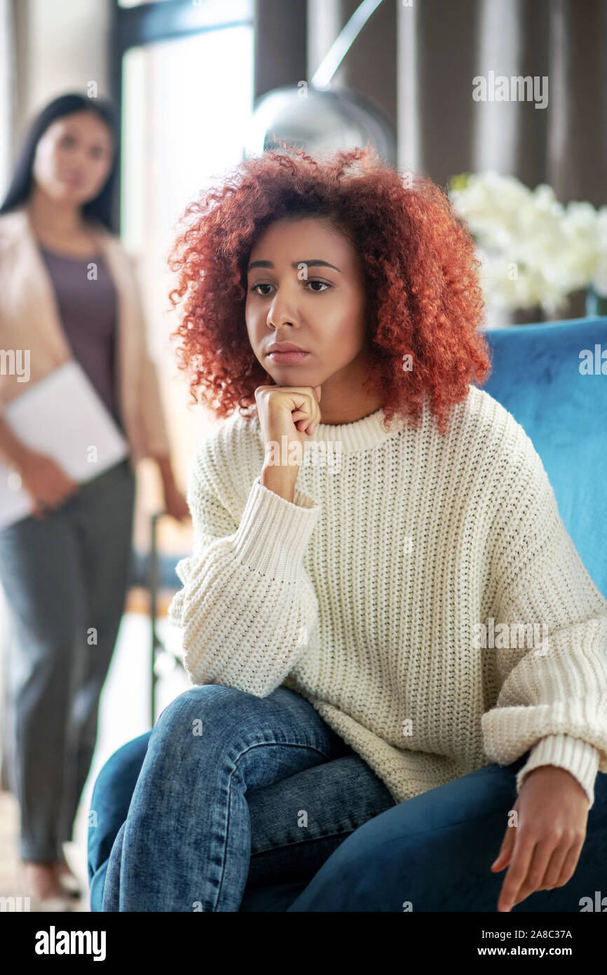 Sad stressed young woman doctor hi-res stock photography and images - Alamy