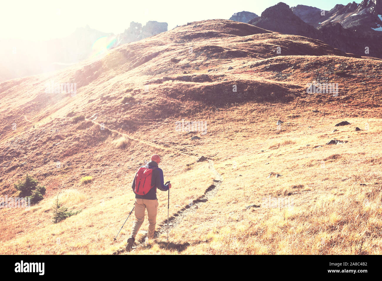 Hike in the autumn mountains. Fall season theme Stock Photo - Alamy