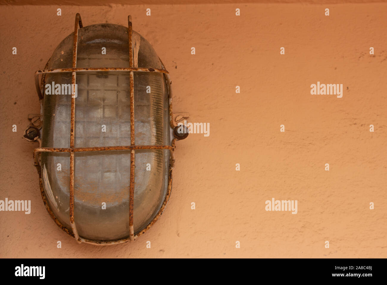 View of outdoor lighting unit covered with glass for protection from ...