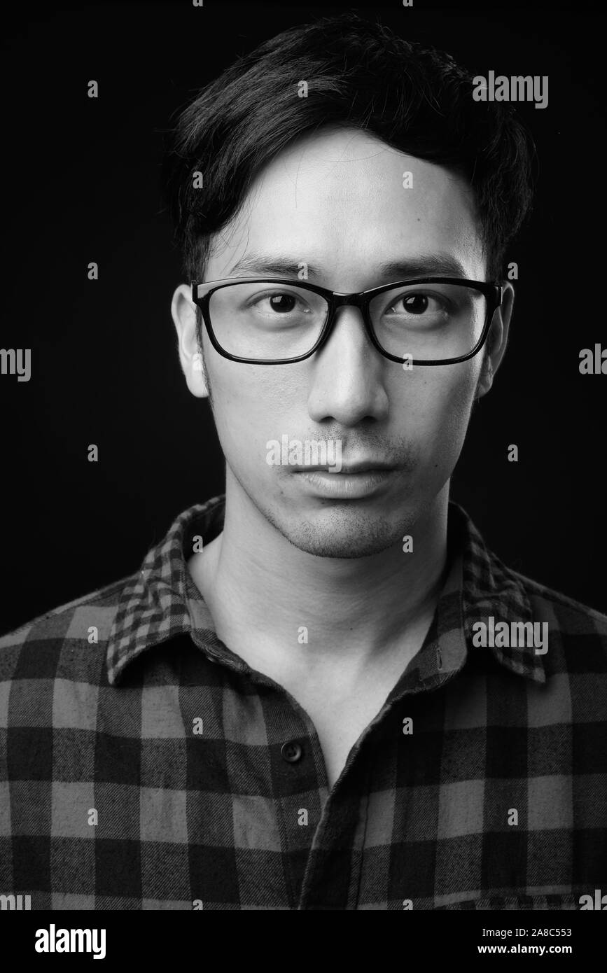 Chinese man glasses Black and White Stock Photos & Images - Alamy