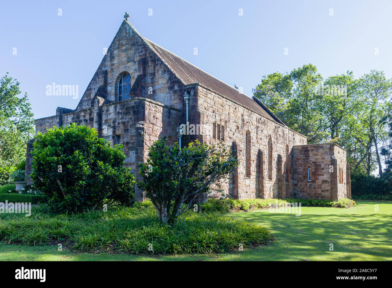Stone chapel abbey building small stone crafted structure in summer ...
