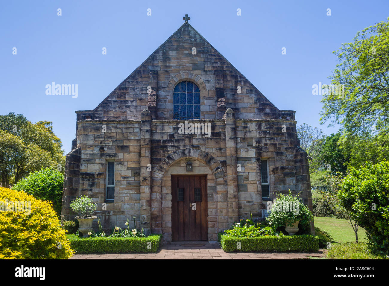 Stone chapel abbey building small stone crafted structure in summer ...