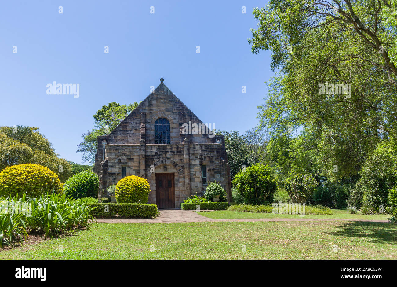Stone chapel abbey building small stone crafted structure in summer ...