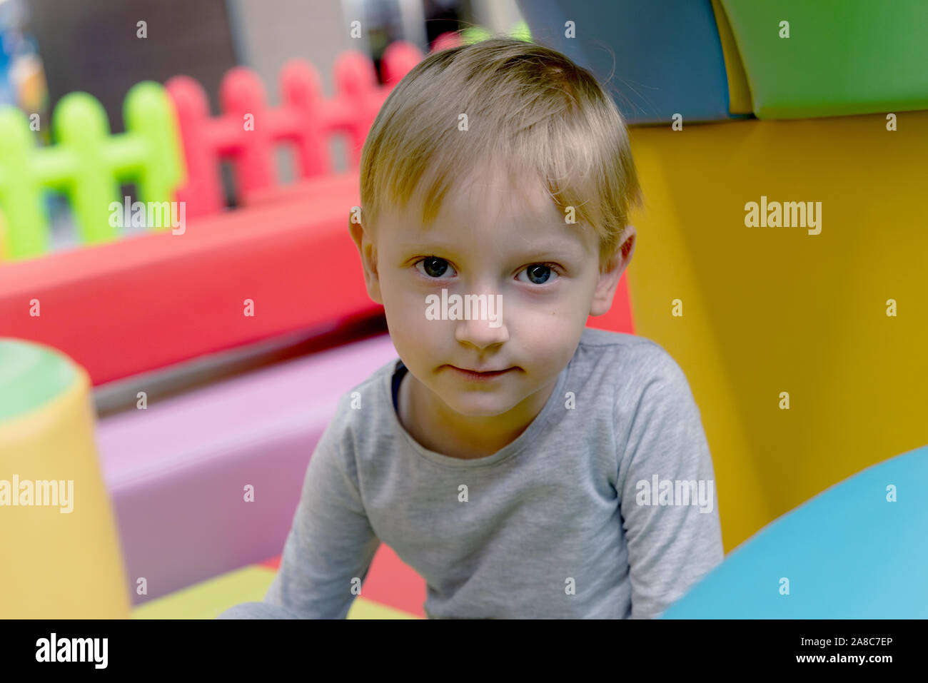 Kid playing at new playground kindergarten. Four years european boy ...