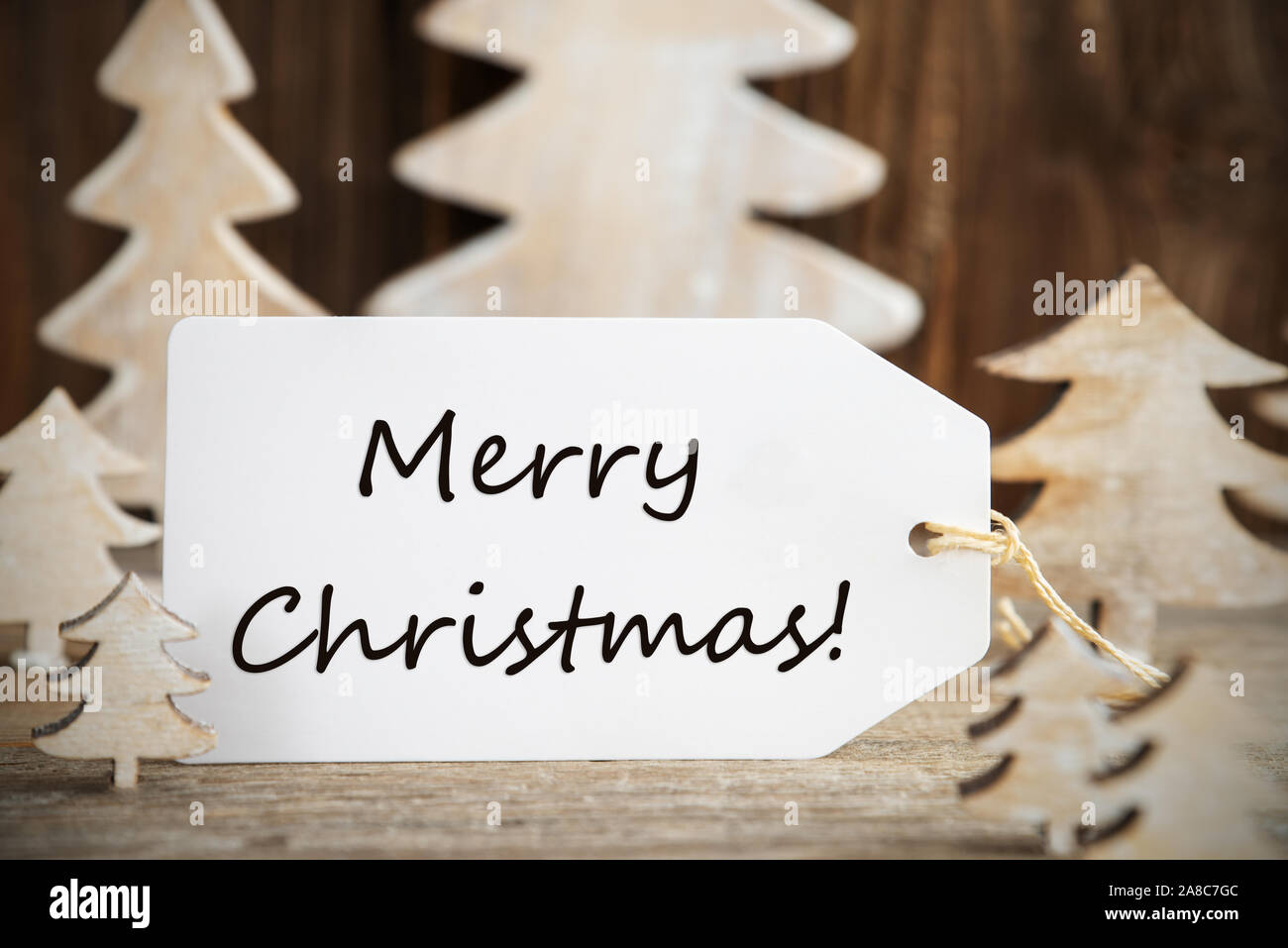 Christmas Tree, Label With English Text Merry Christmas Stock Photo - Alamy