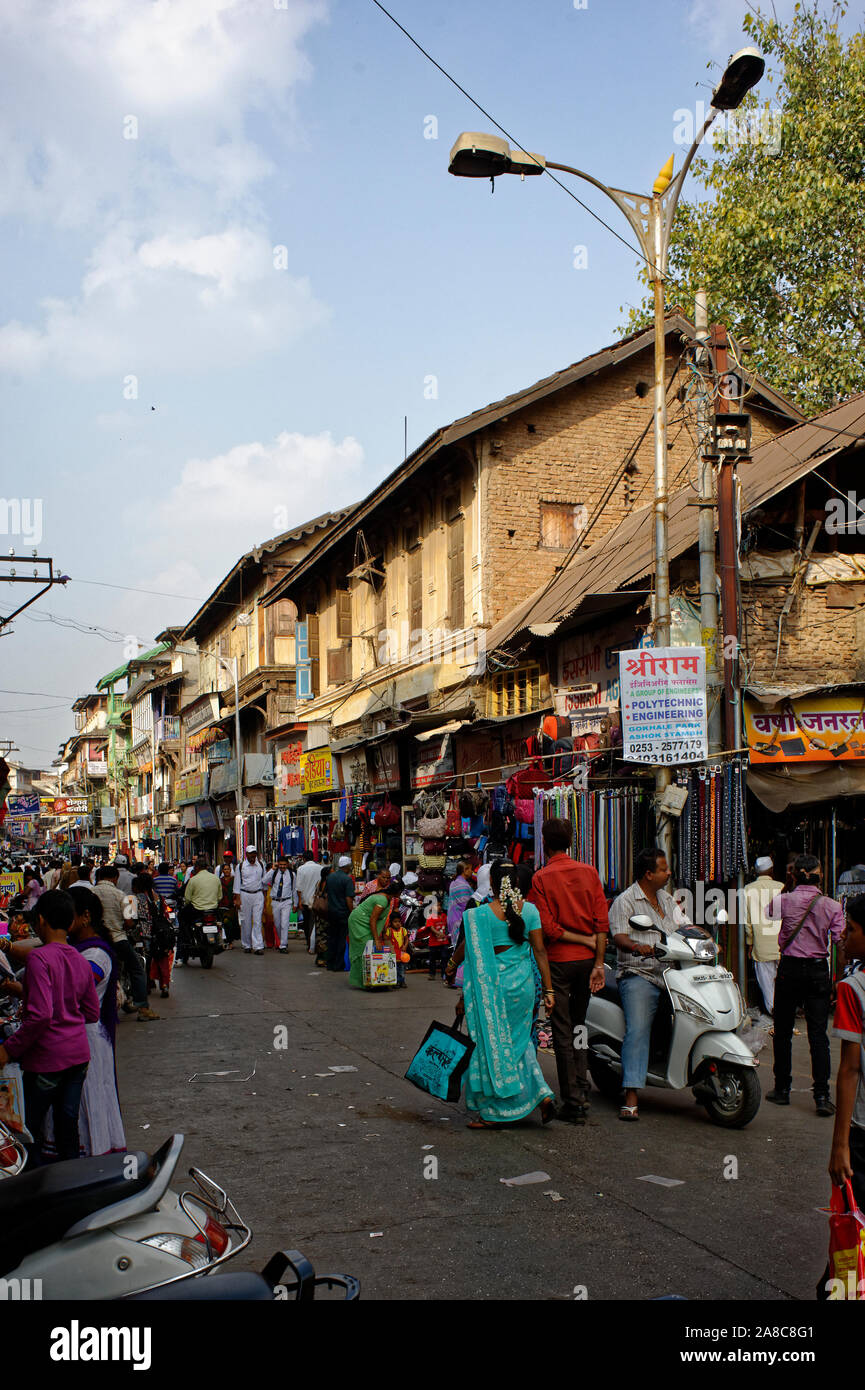 View of a market place with people Stock Photo - Alamy
