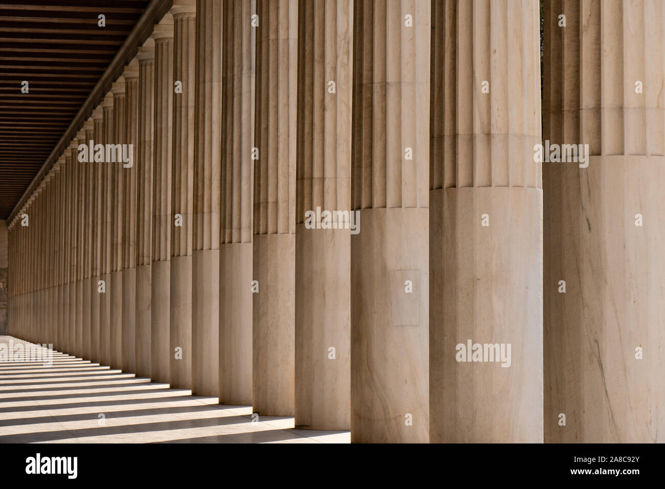 Row of ancient Greek columns in Athens. Architectural abstract Stock ...
