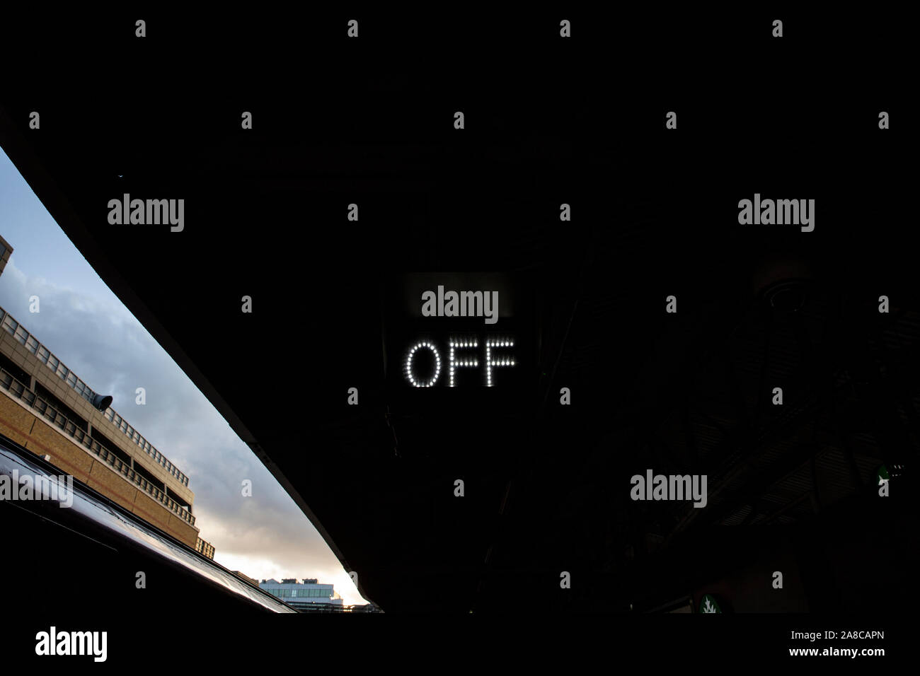 OFF illuminated sign on a station platform Stock Photo - Alamy