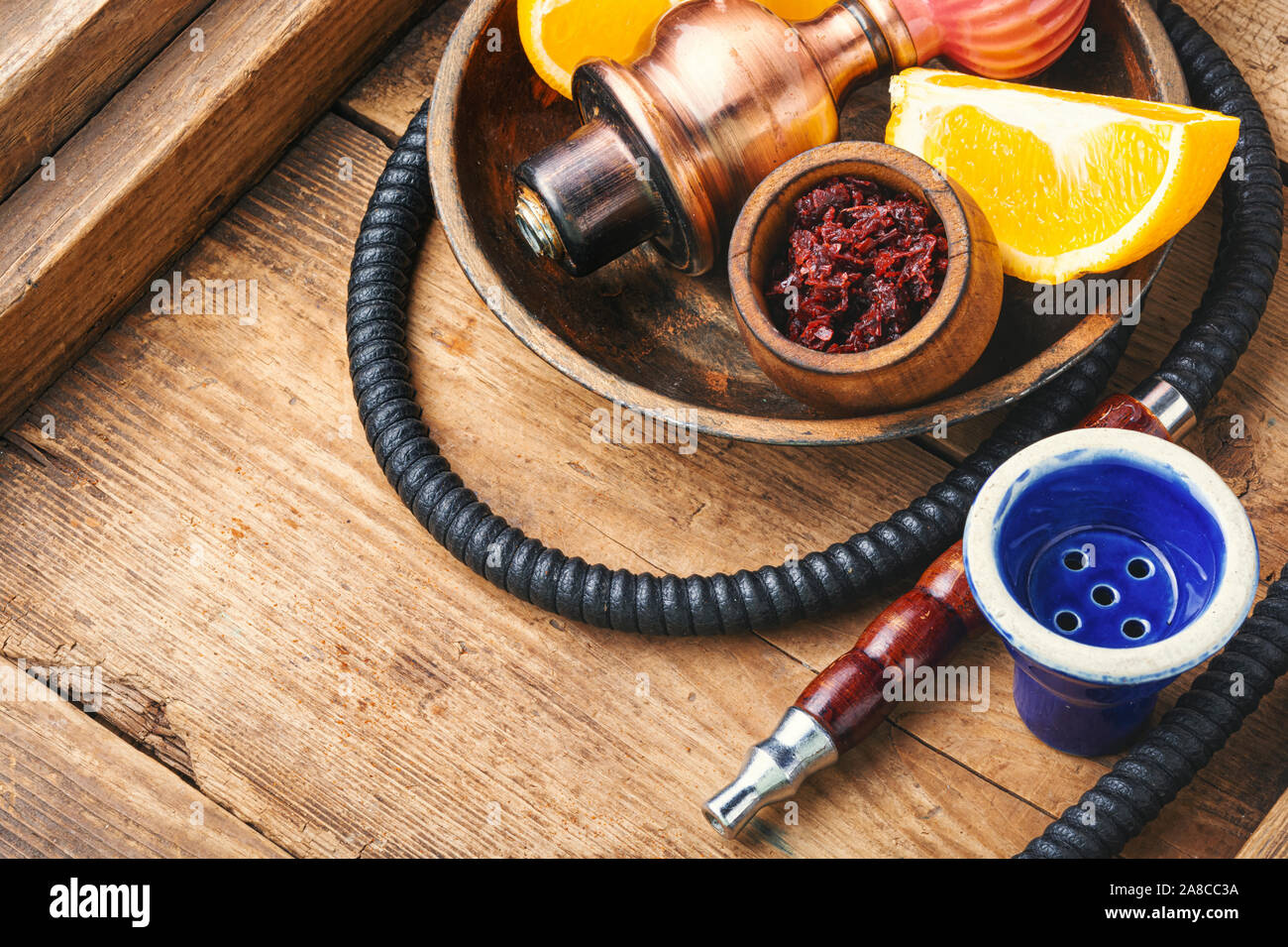 Smoking hookah with the aroma of orange.Details of Oriental hookah ...