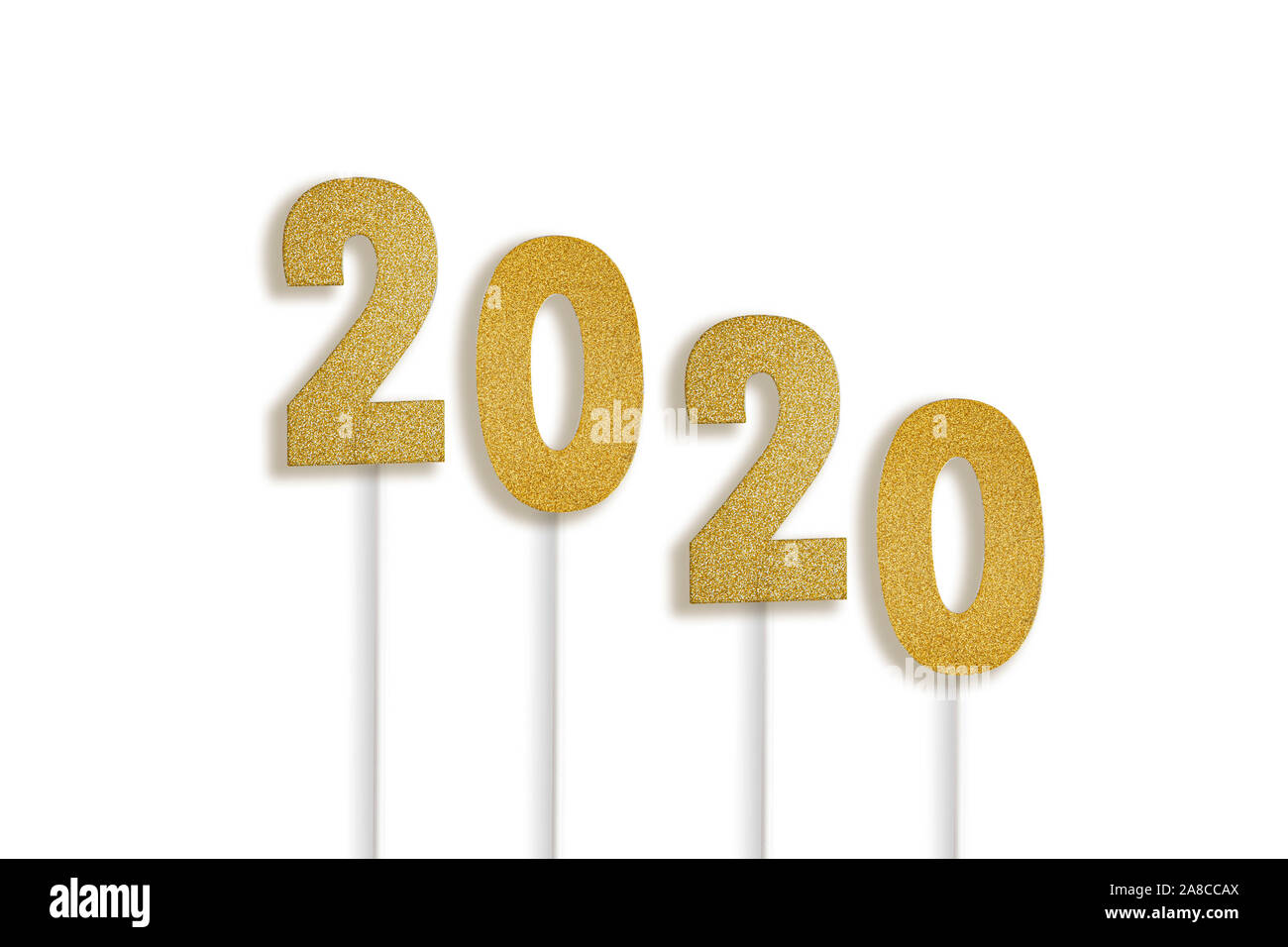 New year 2020 numbers concept with golden glitter and soft shadows ...