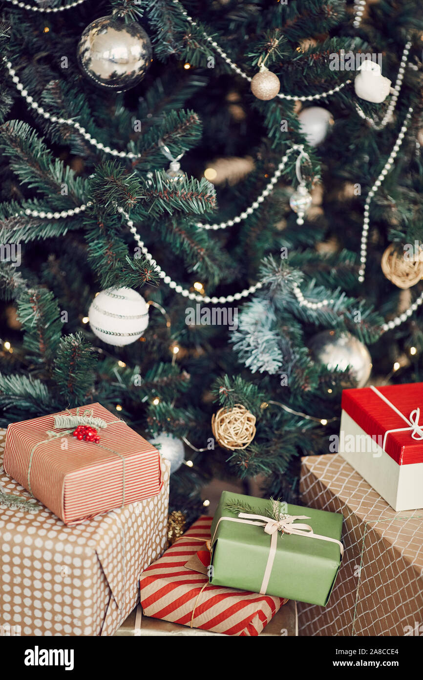 Presents wrapped and under a christmas tree hi-res stock photography ...