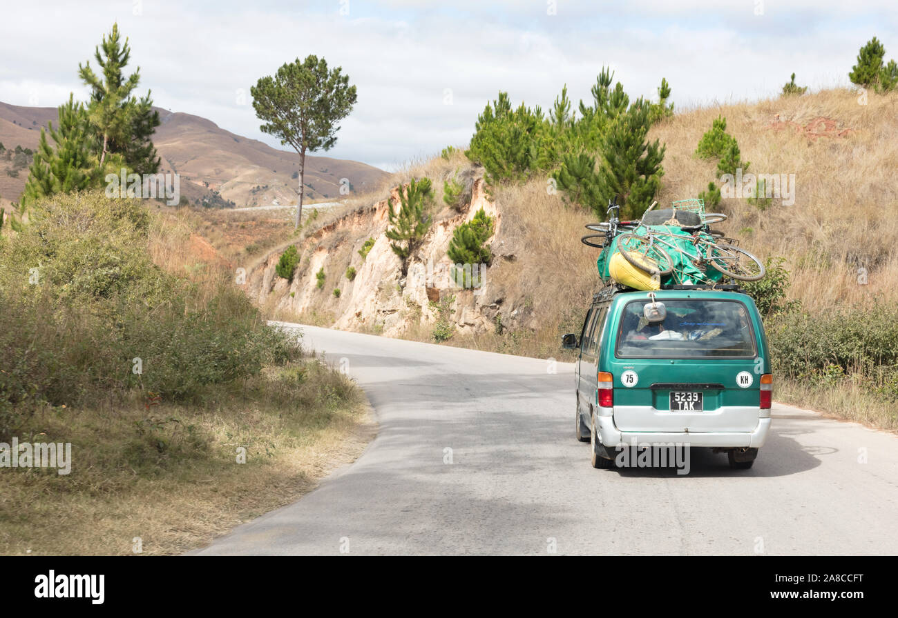 Madagascar on july 27, 2019 - Overloaded bus moves through the vastness ...