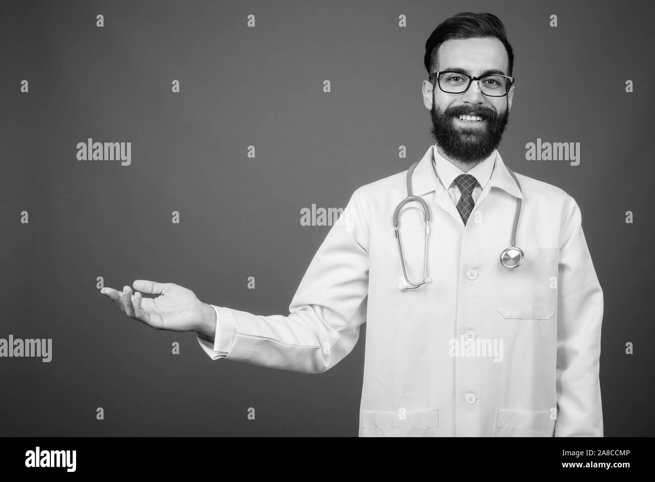 Handsome persian bearded man showing hi-res stock photography and ...