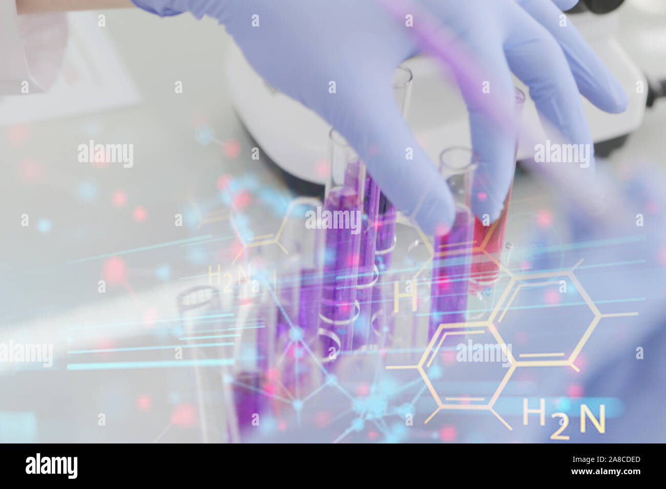 Young female Laboratory scientist working at lab with test tubes and ...