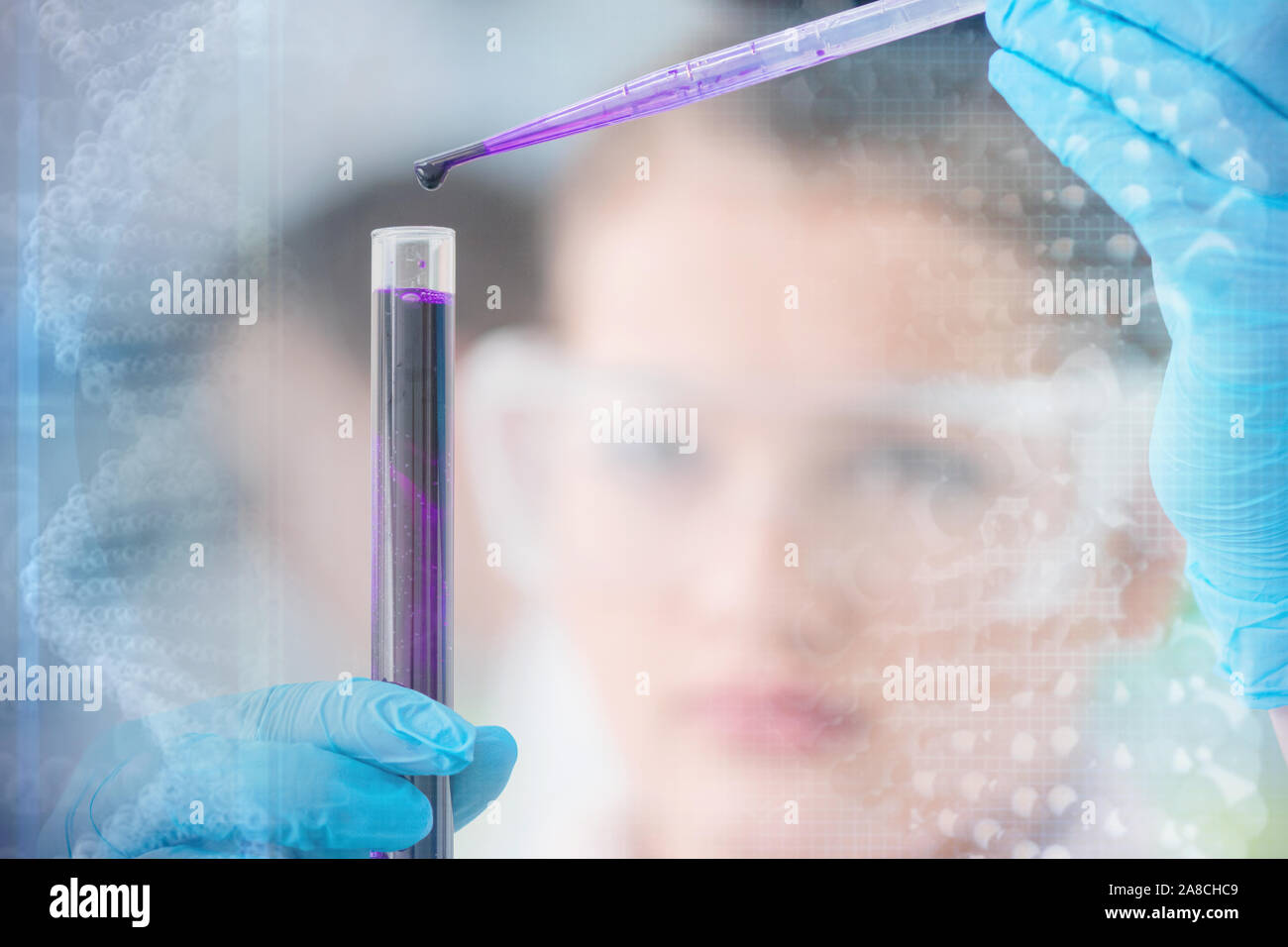 Young female Laboratory scientist working at lab with test tubes and ...