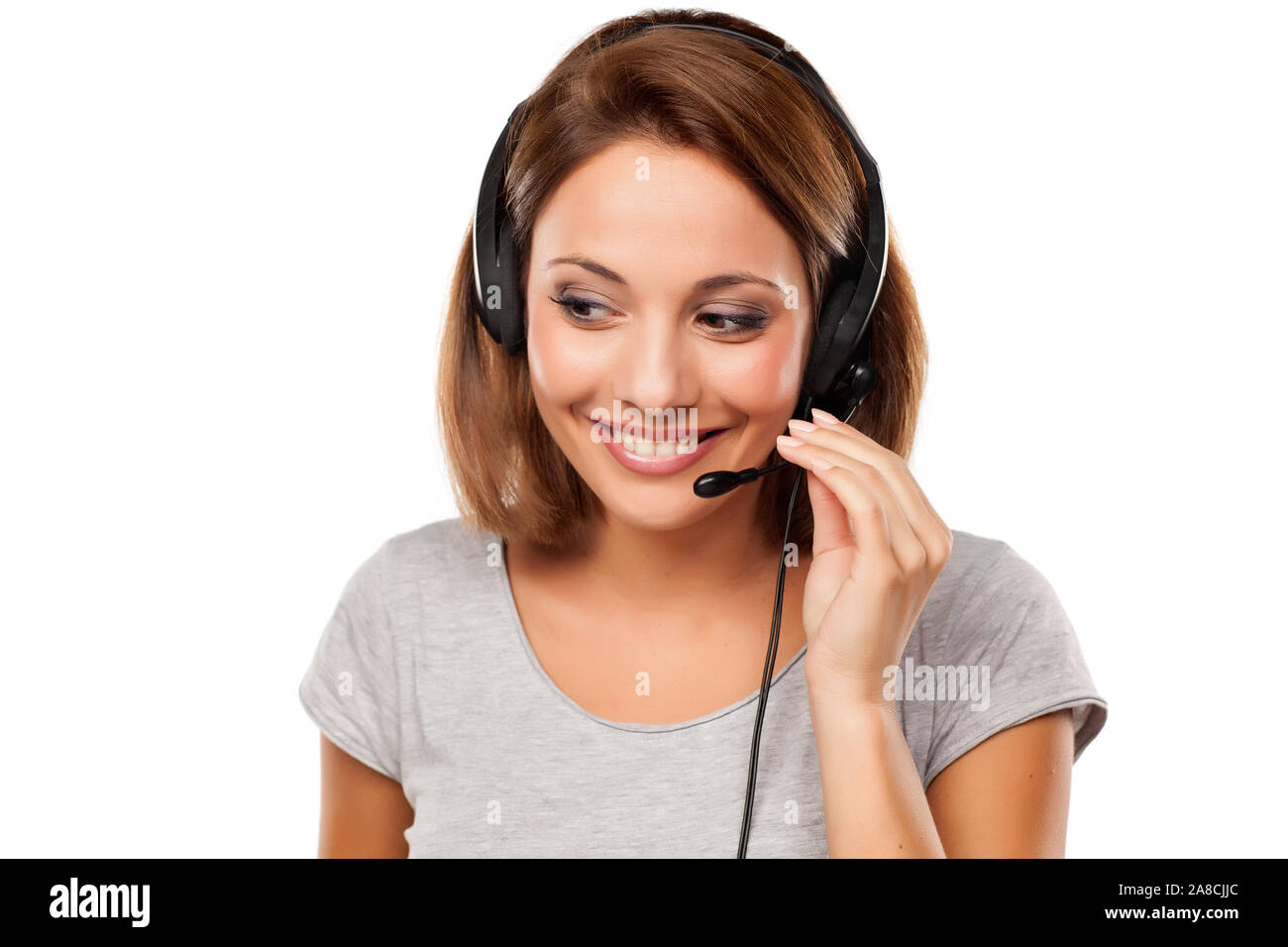 attractive young woman with headset on her head Stock Photo - Alamy