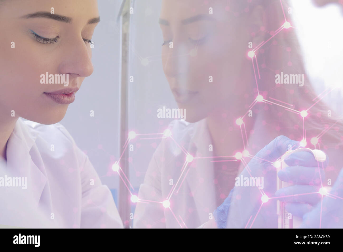 Young female Laboratory scientist working at lab with test tubes and ...