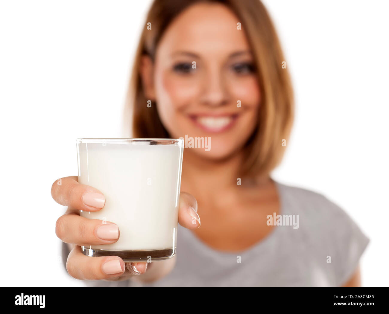 Hand holding glass milk hi-res stock photography and images - Alamy