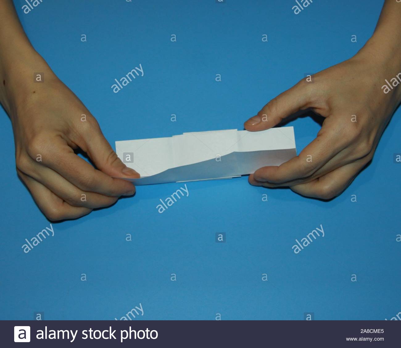 Folded Piece Of White Paper Blank Stock Photos & Folded Piece Of White ...