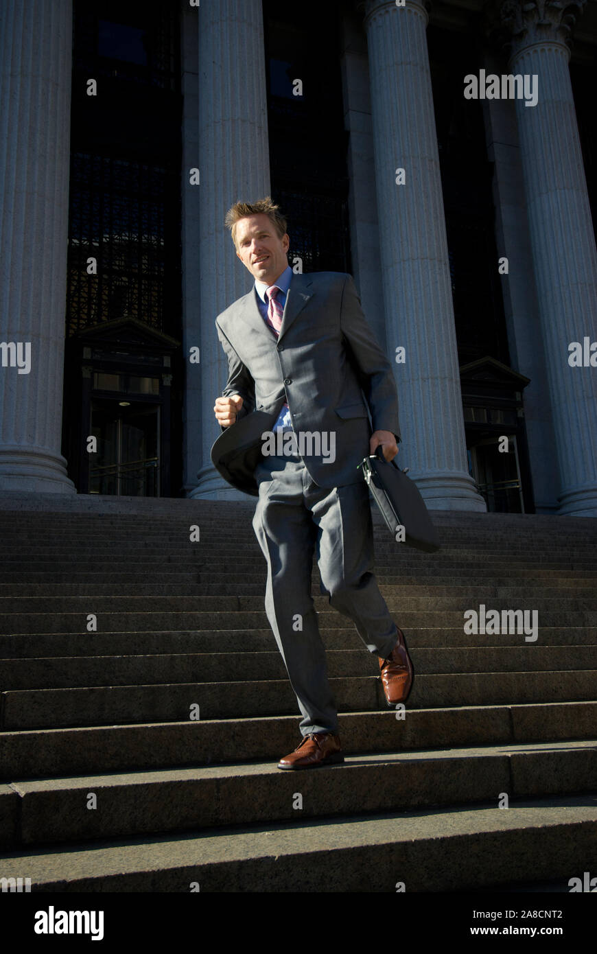 Man walking into courthouse hi-res stock photography and images - Alamy