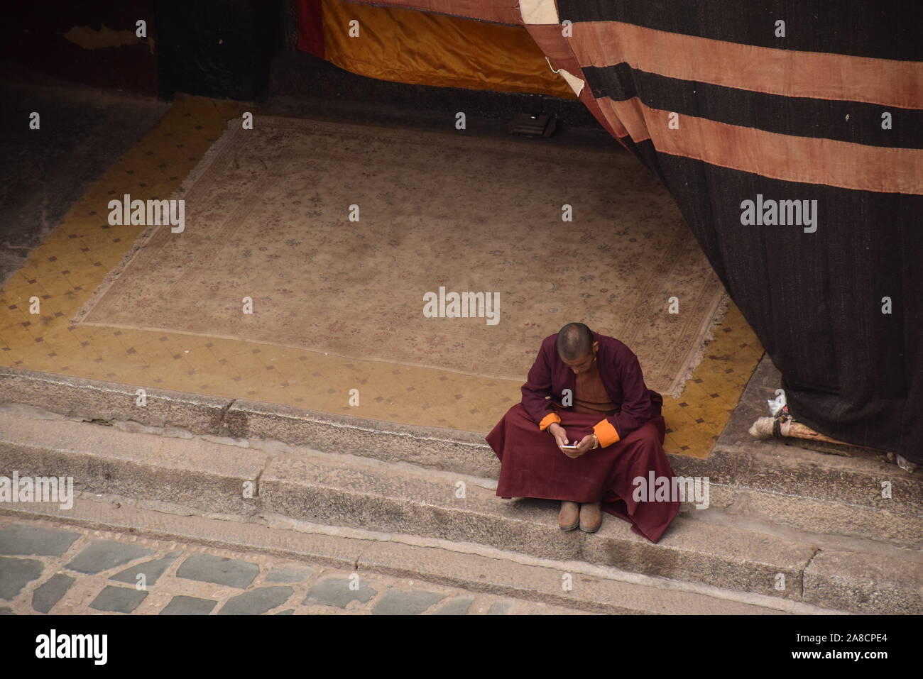Buddhist monk inside Sakya monastery, Tingri county, Tibet - China ...