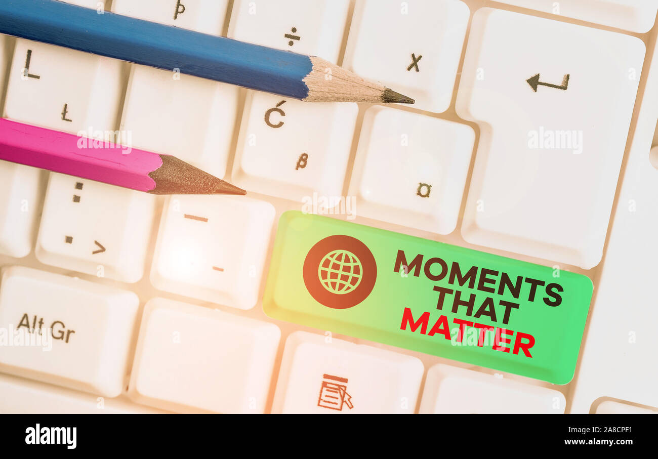 Writing note showing Moments That Matter. Business concept for ...