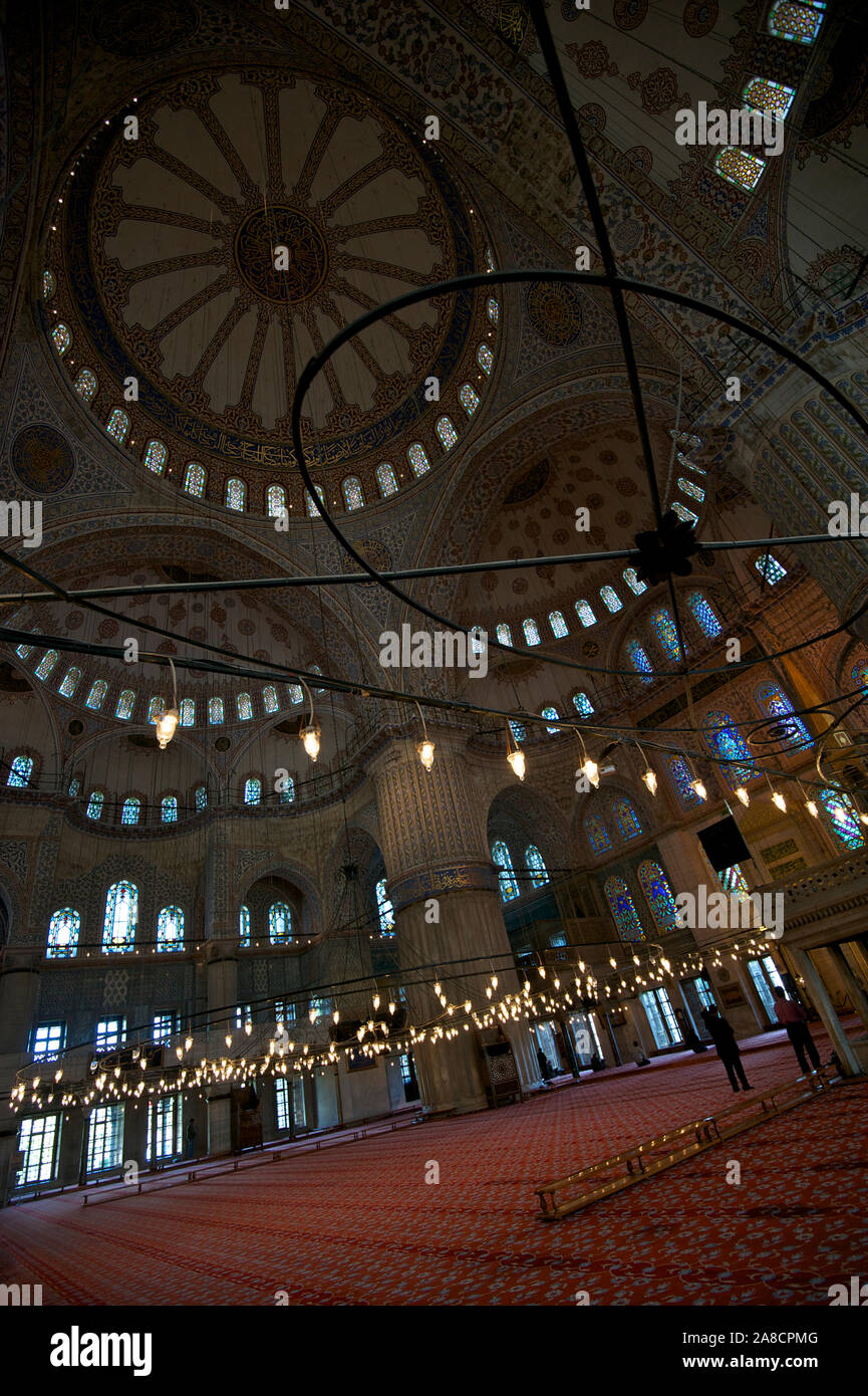 Interior view of the soaring prayer hall of the Blue Mosque in Istanbul ...