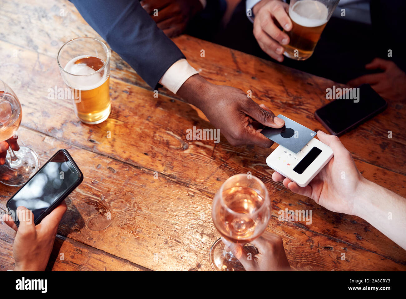 Buying a round of drinks hi-res stock photography and images - Alamy